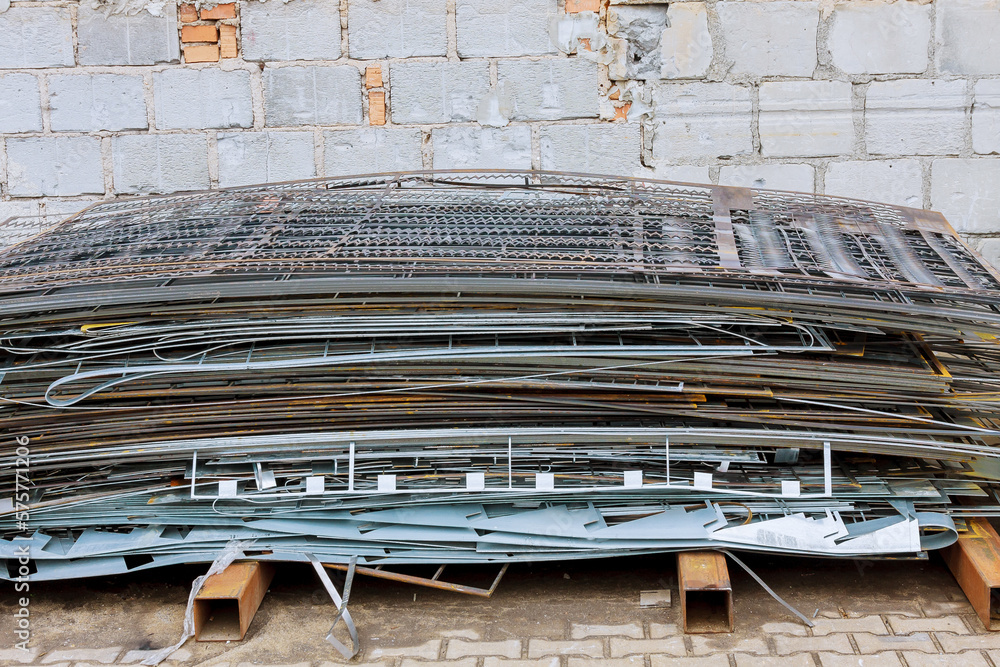 Waste laser cut sheet metal. Waste from heavy industry. Stock Photo ...