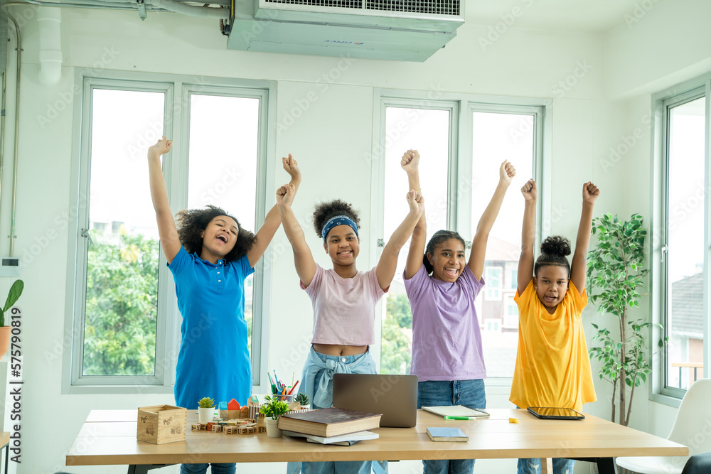Black girl are taking test in elementary classroom school with diverse ...
