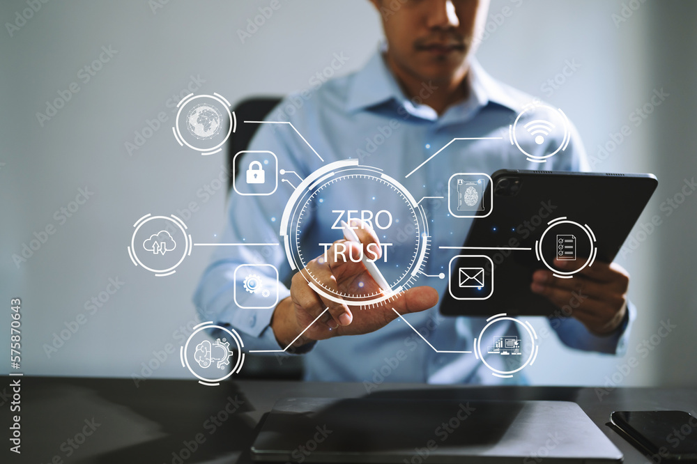 Zero trust security concept Person using computer and tablet with zero ...