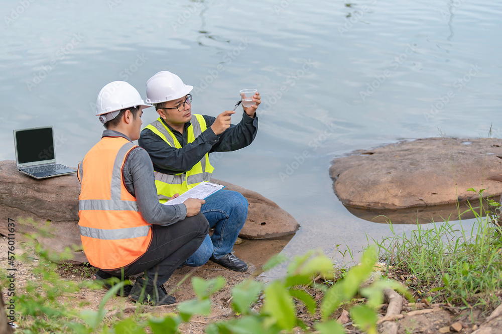 Environmental engineers inspect water quality,Bring water to the lab ...