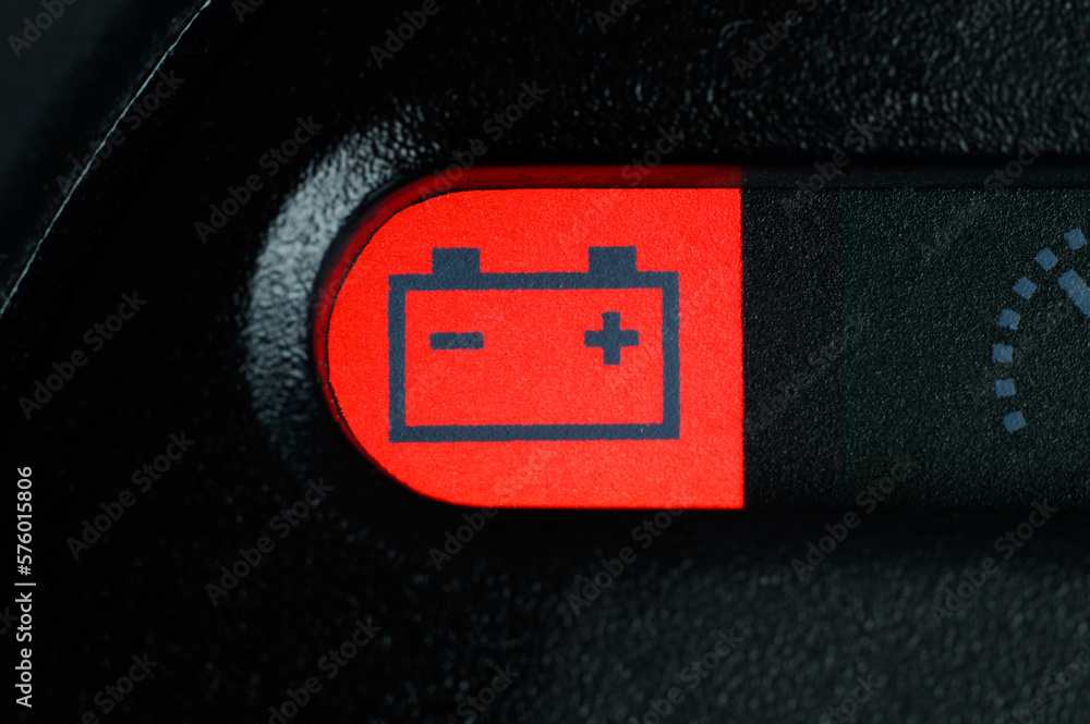 Close-up of the battery charge indicator light on the dashboard of the ...