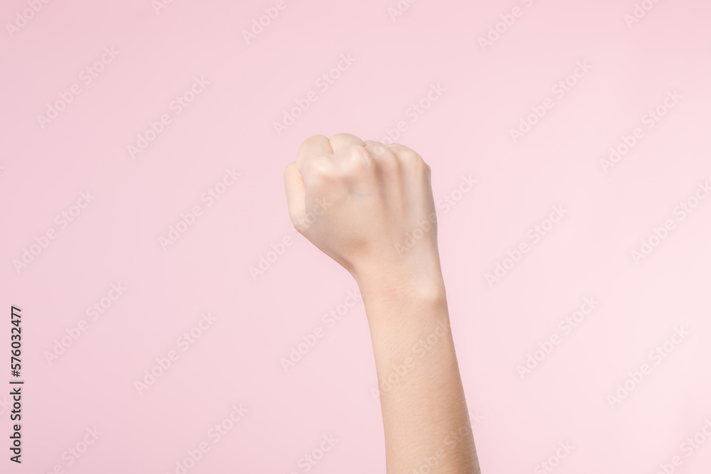 Woman fist fight for human rights and feminist with pink pastel ...