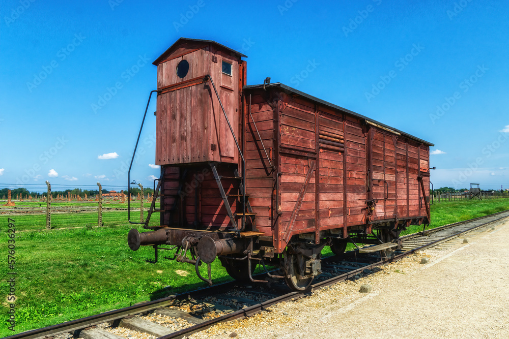 Abandoned train wagon in the rail entrance to concentration camp at ...