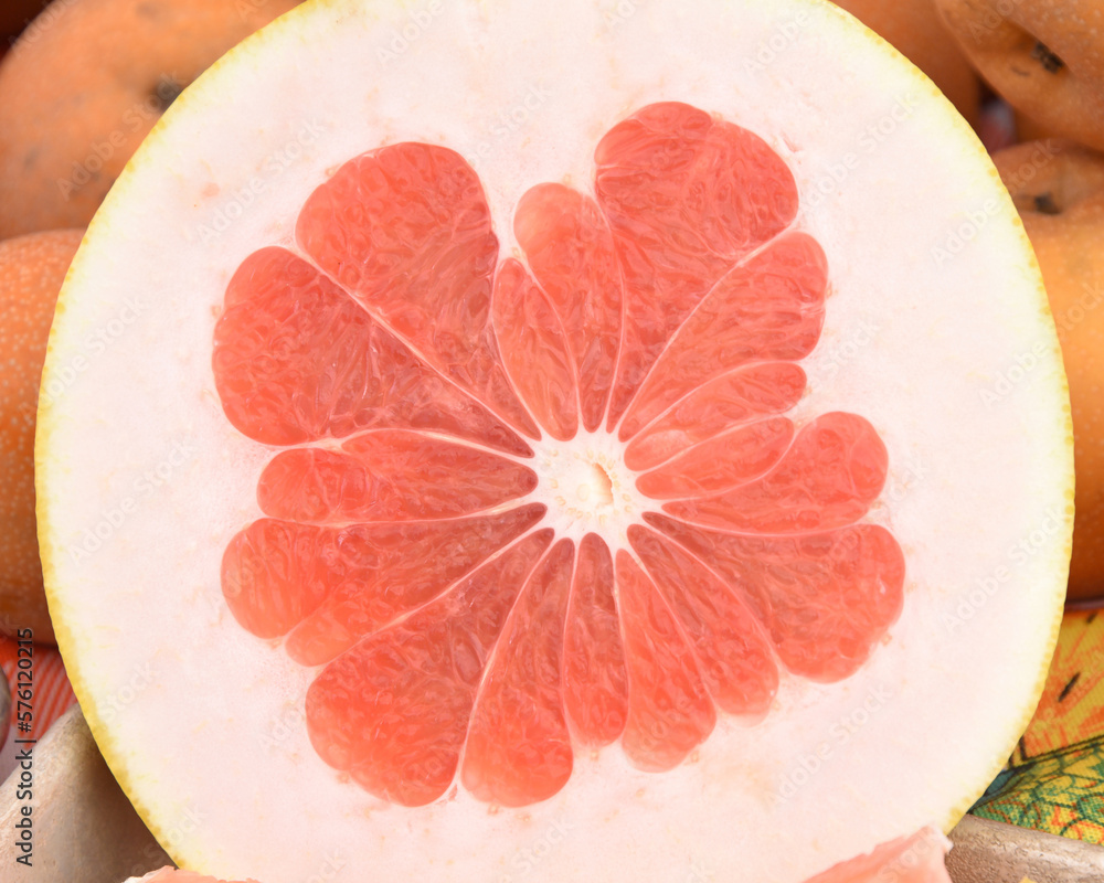 Cross section of a large Pomelo. It is the largest citrus fruit from ...