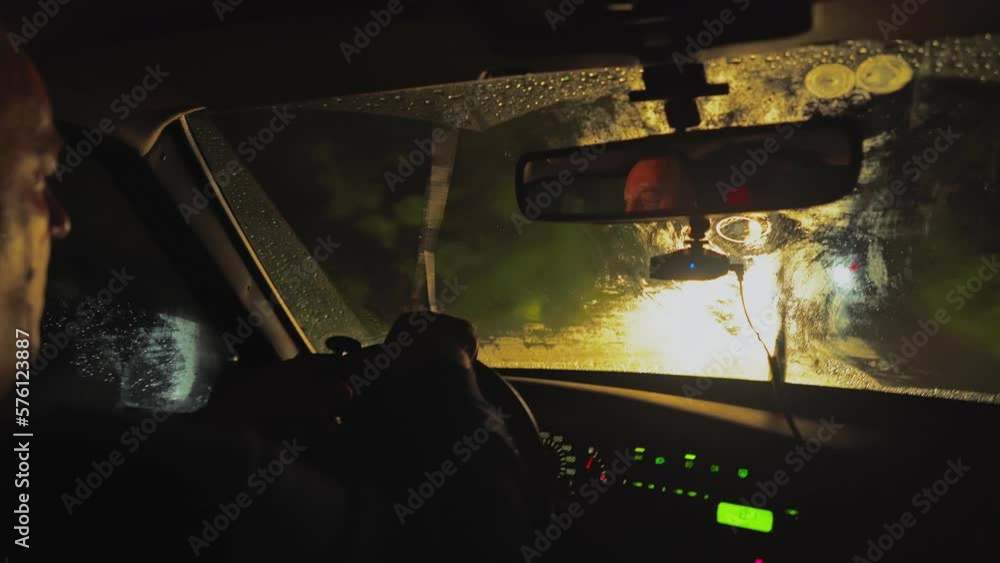 Driver In A Car Driving At Night The Light Of Oncoming Cars Blinds His ...