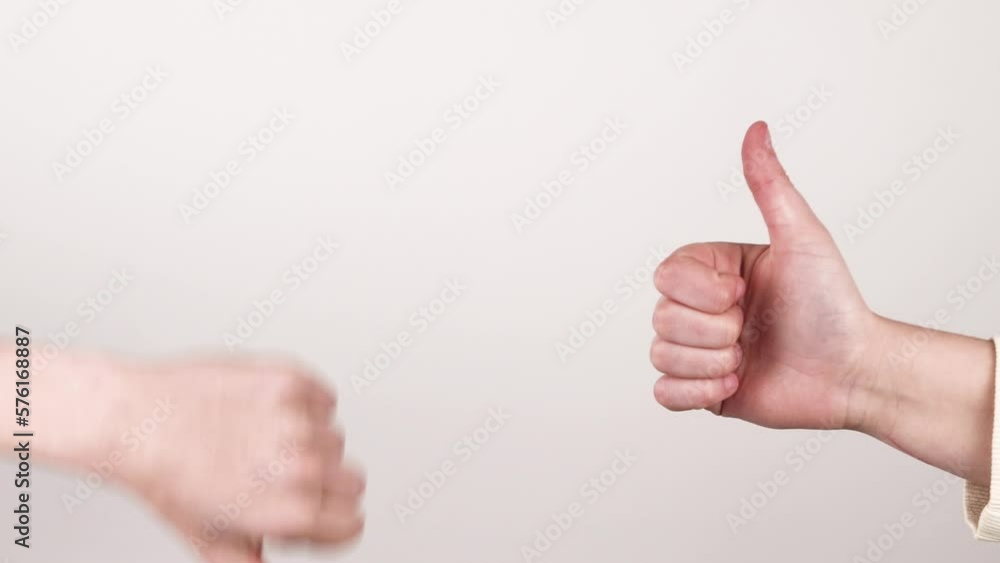 Two types of hand gestures. One thumbs up and one thumbs down. Stock ...