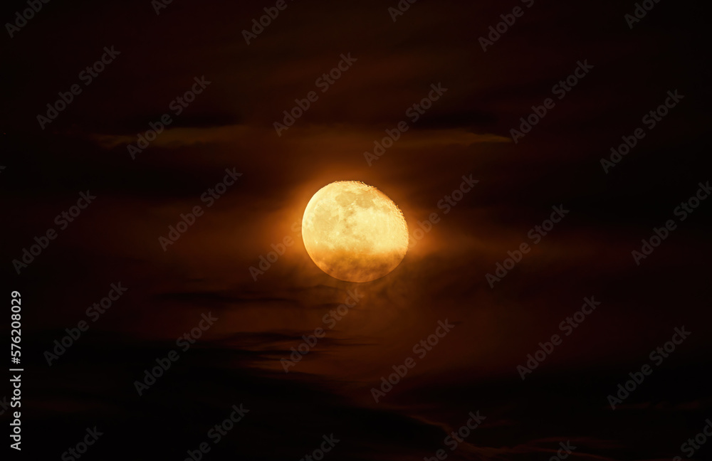 Orange full moon. High-resolution picture of the moon by telescope ...