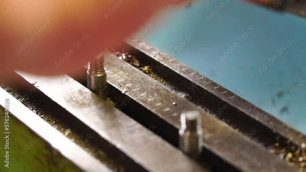 metalworking industry: close up hole drilling in copper bars for ...