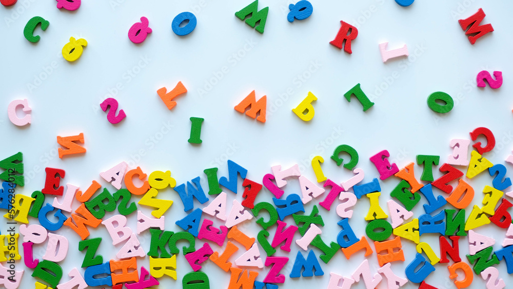 Colorful random wooden letters background Stock Photo | Adobe Stock