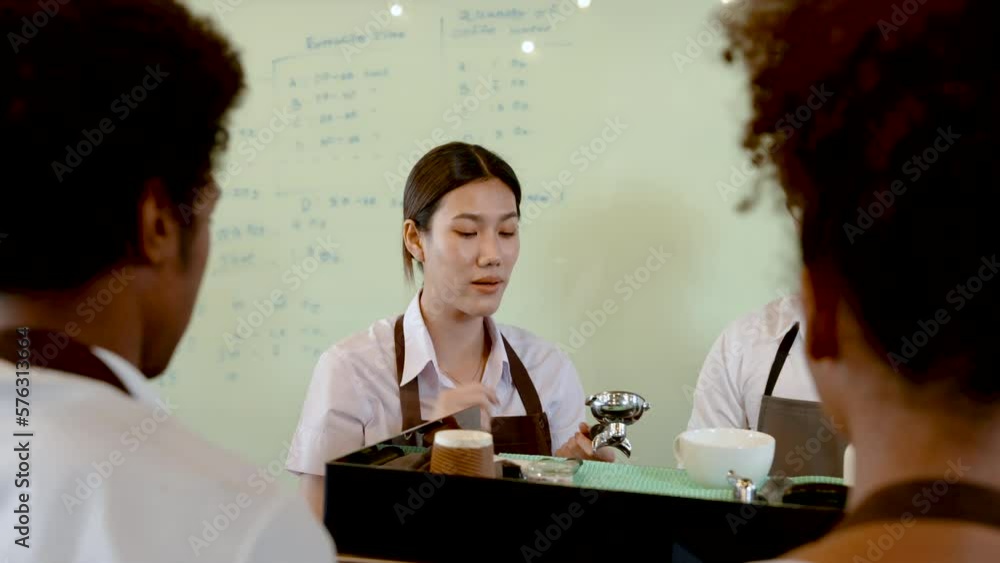 4K, female barista teacher picking up handle coffee maker, have ...