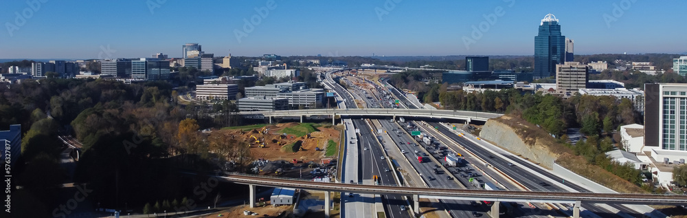 Panorama aerial Skytrain railway, elevated bypass, busy traffic on ...