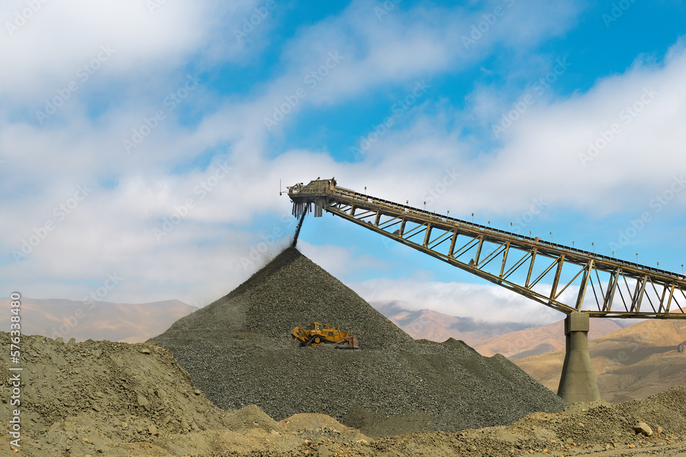 Stockpile and conveyor belt at an open-pit copper mine in Copiapo ...
