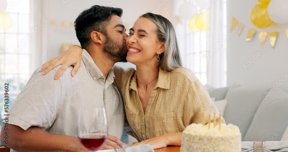 Interracial couple, gift and celebrate birthday being happy, kiss and ...
