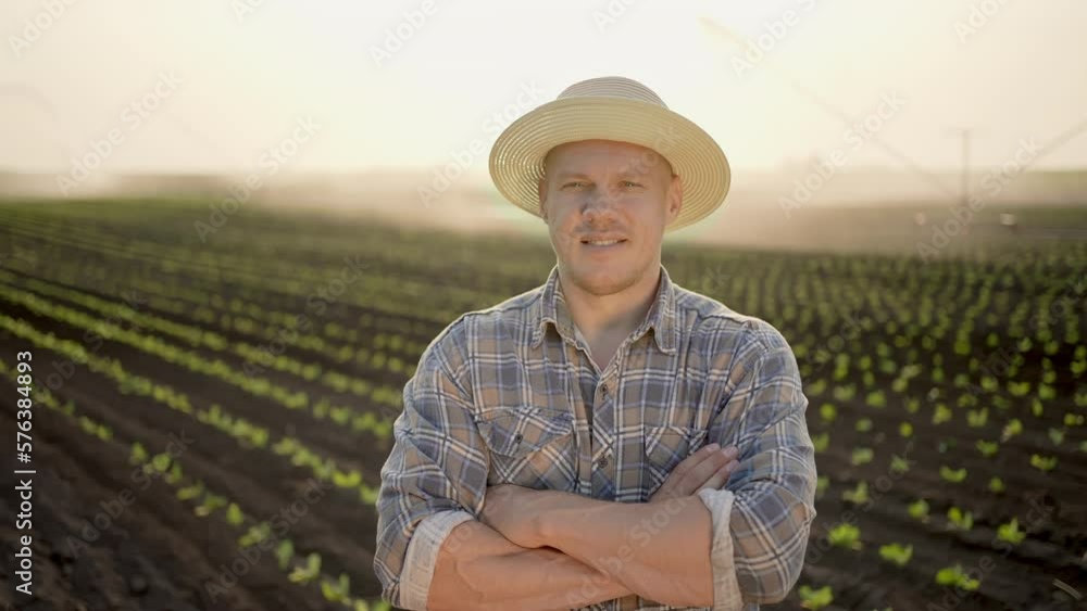 Portrait of young caucasian male farmer man worker with hat arms ...