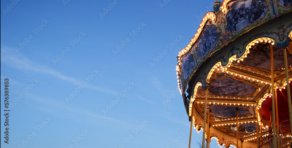 bright background, banner sky and carousel, amusement park, glowing ...