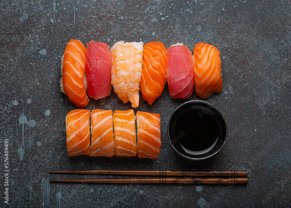 Set of traditional Japanese sushi and rolls top view with soy sauce and ...