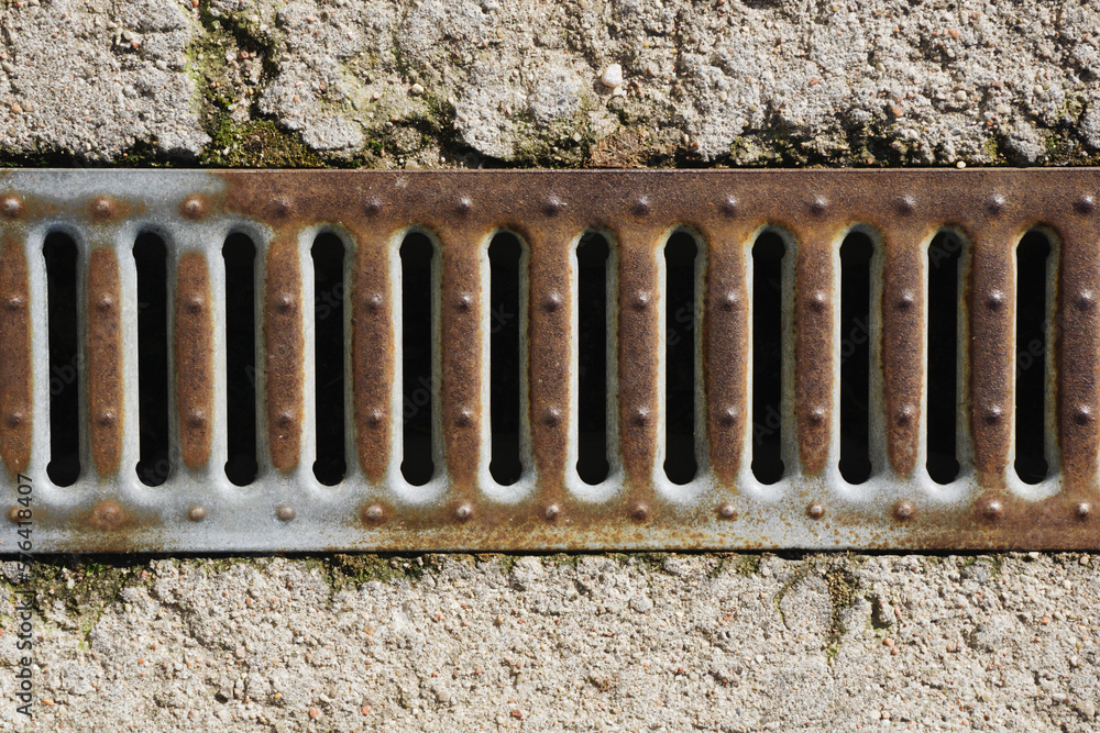 Manhole on concrete drain system cover. Urban sewer background. Metal ...
