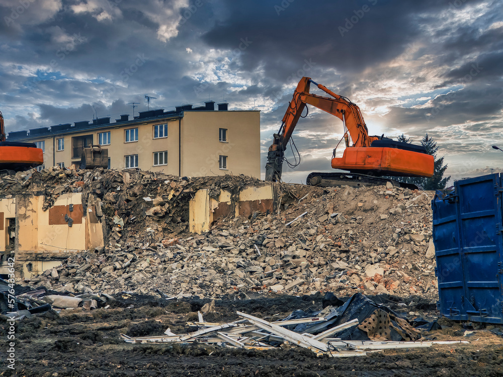 Dismantling the Past: Powerful Yellow Excavator Razes Armored Concrete ...