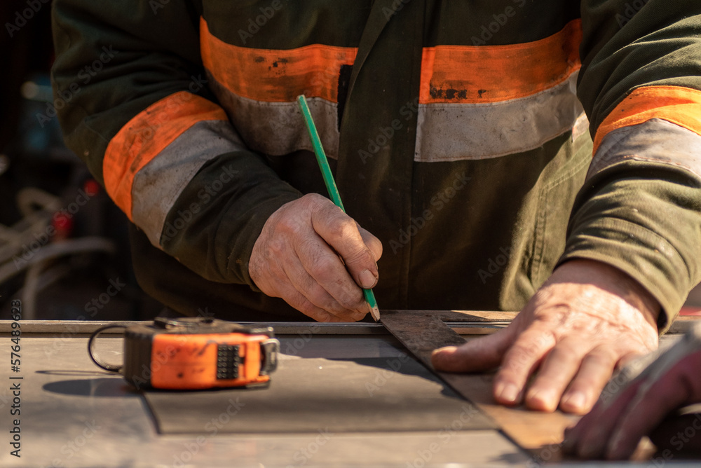cutting metal with an angle grinder,wood, worker, carpenter, work ...