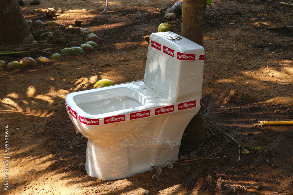 A toilet bowl under a palm tree in Gokarna, India on January 13, 2023 ...