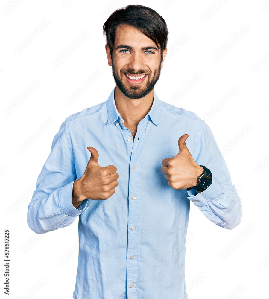 Hispanic man with blue eyes wearing business shirt success sign doing ...