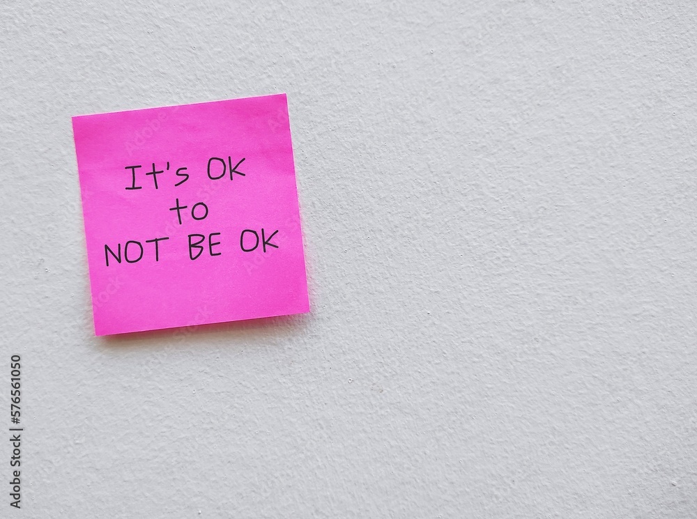 Torn note paper stick on red copy space background with text written IT ...