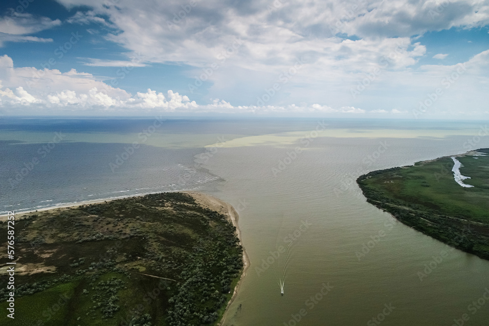 Danube river merge point with Black sea. Aerial view over this iconic ...