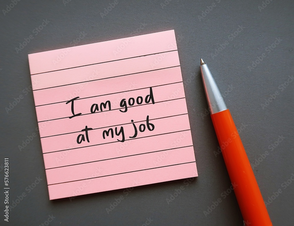 Office note pad on gray copy space background with handwriting - I am ...