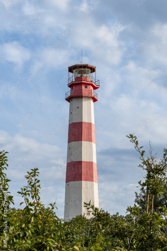 Gelendzhik. Modern lighthouse on thick cape. Multifaceted red and white ...