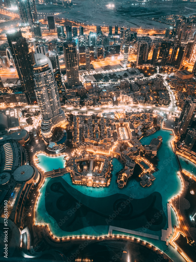 Aerial view of Downtown Dubai with roads, Dubai Mall and the fountain ...