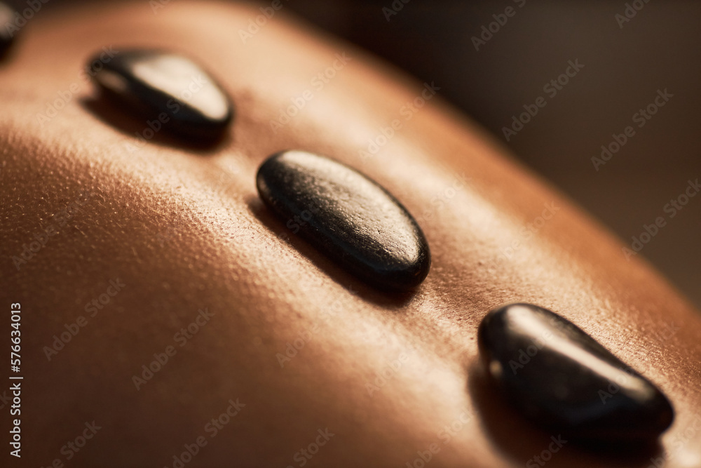 Hot basalt stones engaging with soft tissue to help melt away tension ...