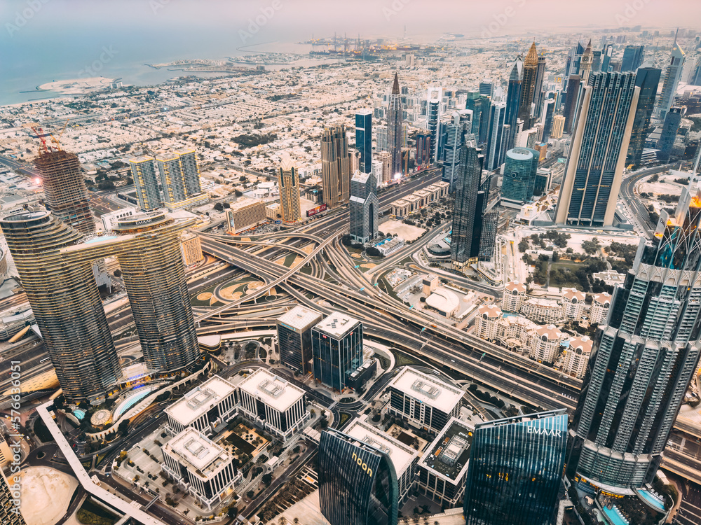 Aerial view of Downtown Dubai with roads, Dubai Mall and the fountain ...