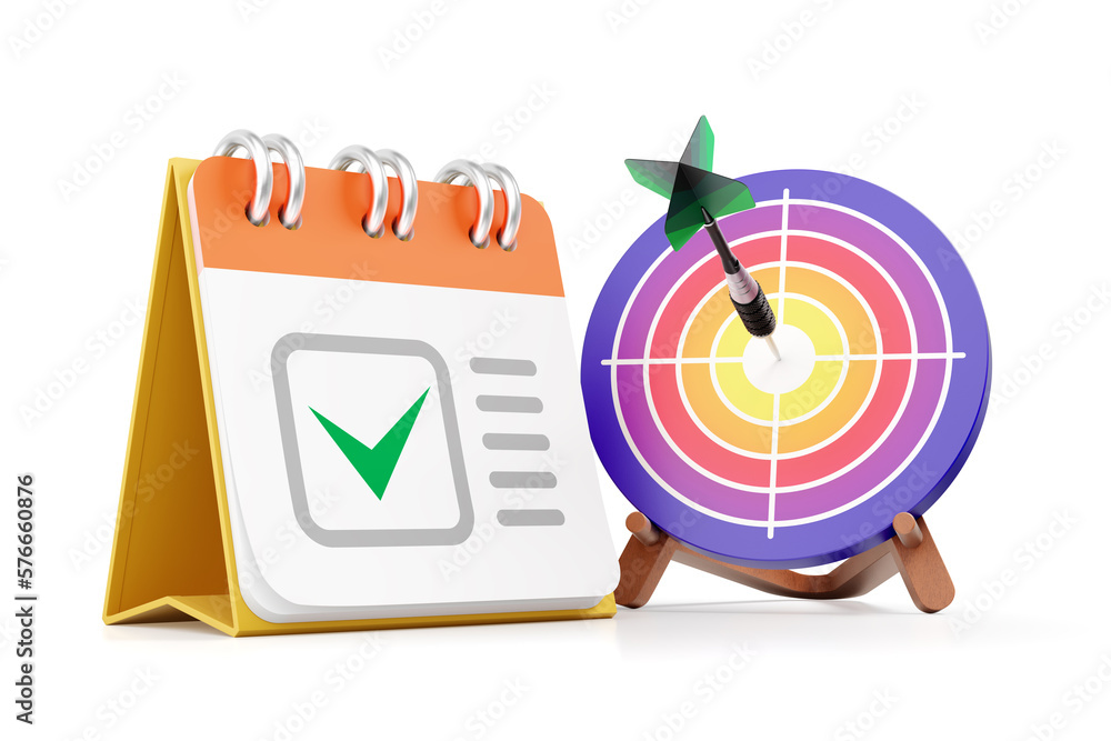 Business Goals. A checkmark sign on the page of a desk calendar beside ...