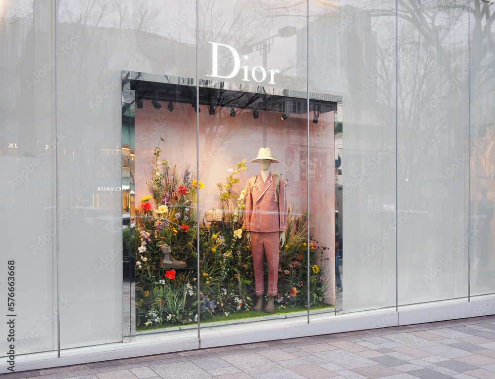 TOKYO, JAPAN - March 1st, 2023: Display in the window of a Dior store ...