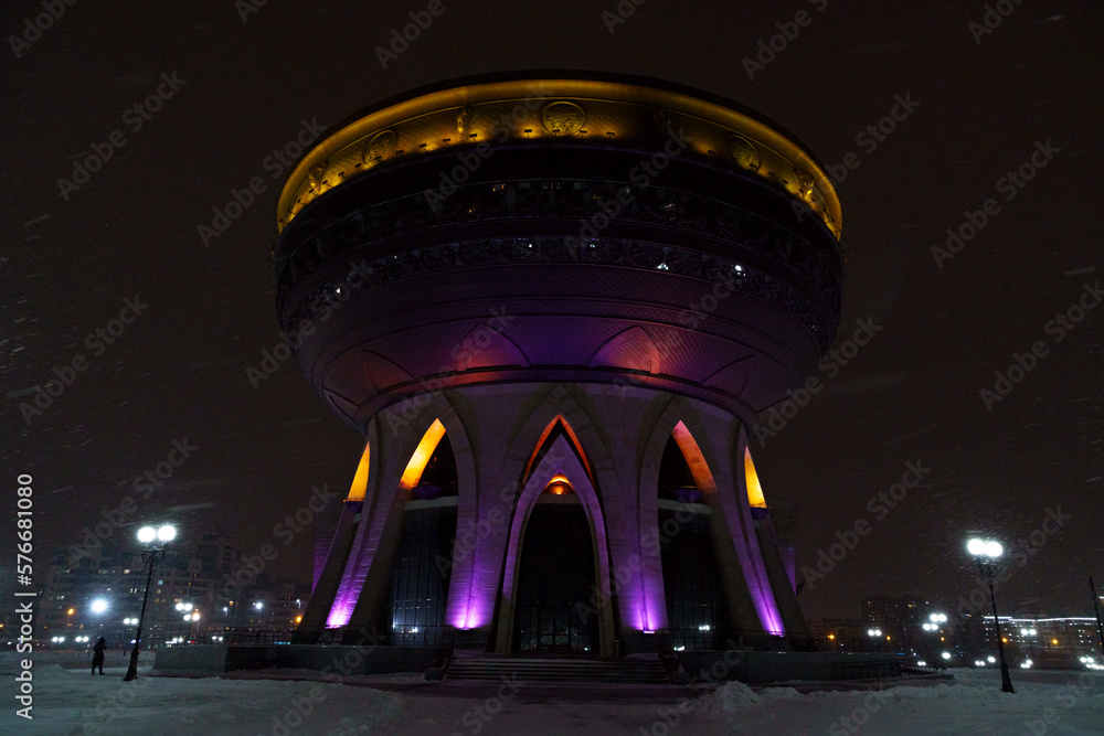 Building of registry office as huge cauldron, illuminated on winter ...