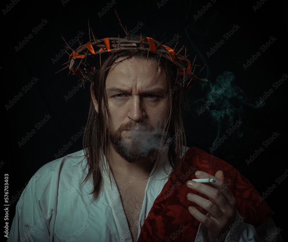 Jesus Christ smokes a cigarette wearing a crown of thorns and white ...