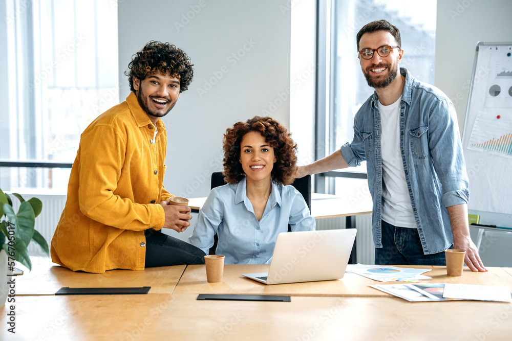 Group portrait of motivated employees of the company of different ...