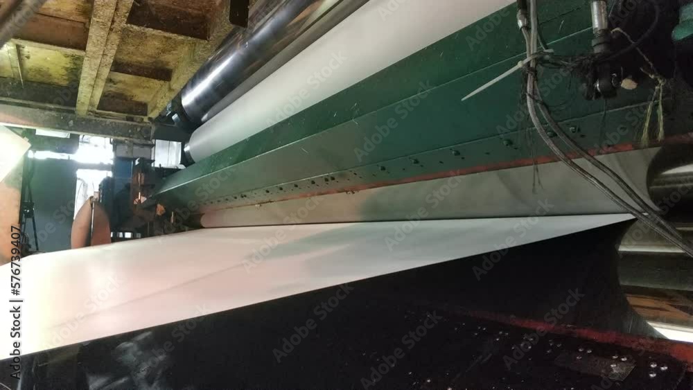 Video process of paper making in a section named calender, paper that ...