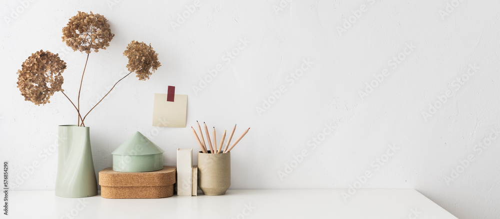 Office table, empty desk with simple office things and white wall copy ...