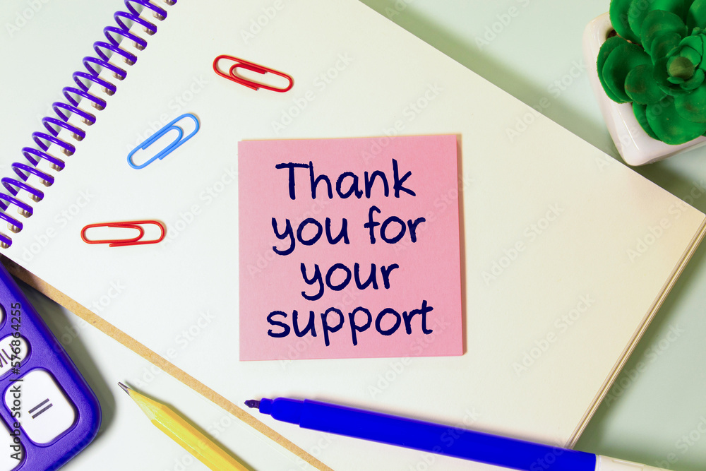 Thank you for your support text write on paper as background with pen ...
