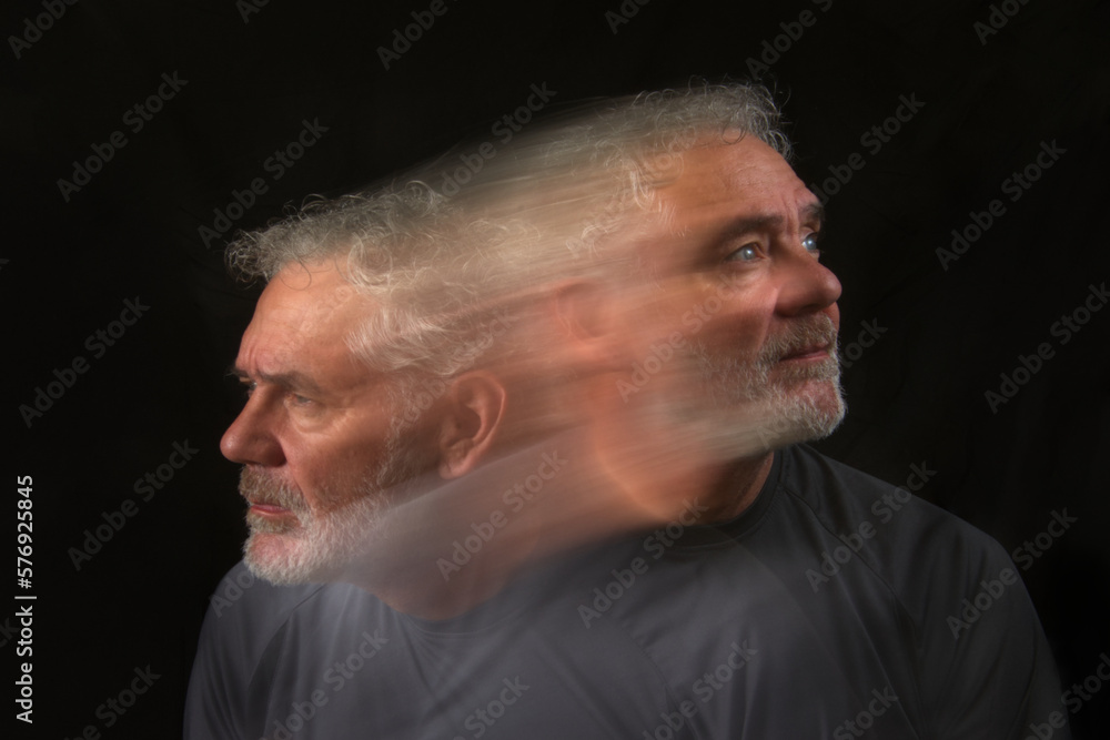 Portrait of an attractive older Caucasian man. Shows two views, one ...