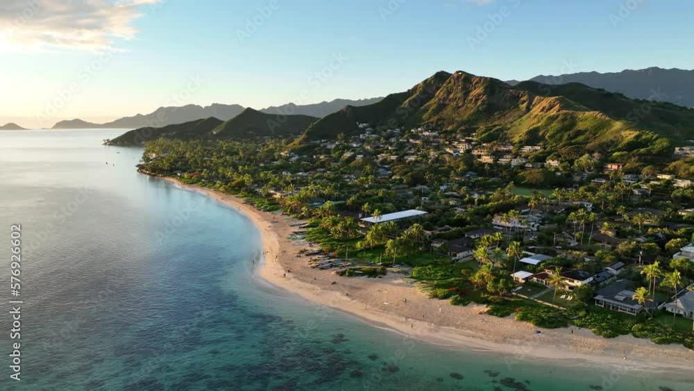 panning shot birds eye view aerial drone of lanikai beach and mokulua ...