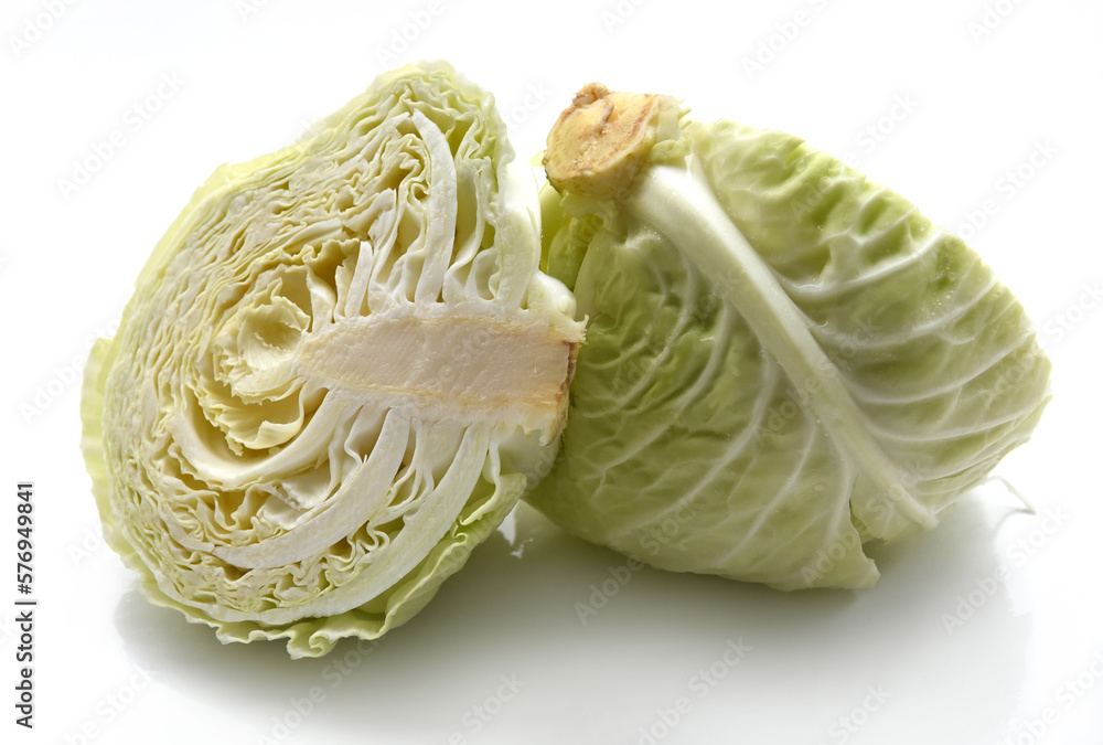 Two halves of cabbage head closeup, isolated on white background, with ...