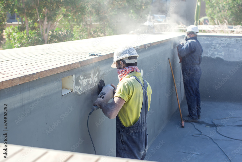 Concrete ceiling surface of the pool grinding by angle grinder Photos ...