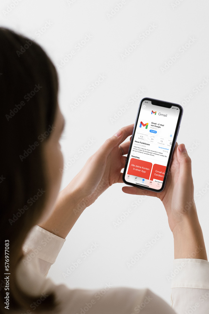 Mobile phone with Gmail App Store screen Stock Photo | Adobe Stock