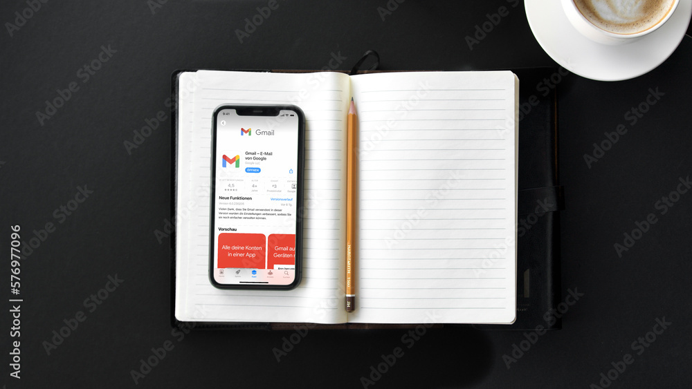 Mobile phone with Gmail App Store screen Stock Photo | Adobe Stock