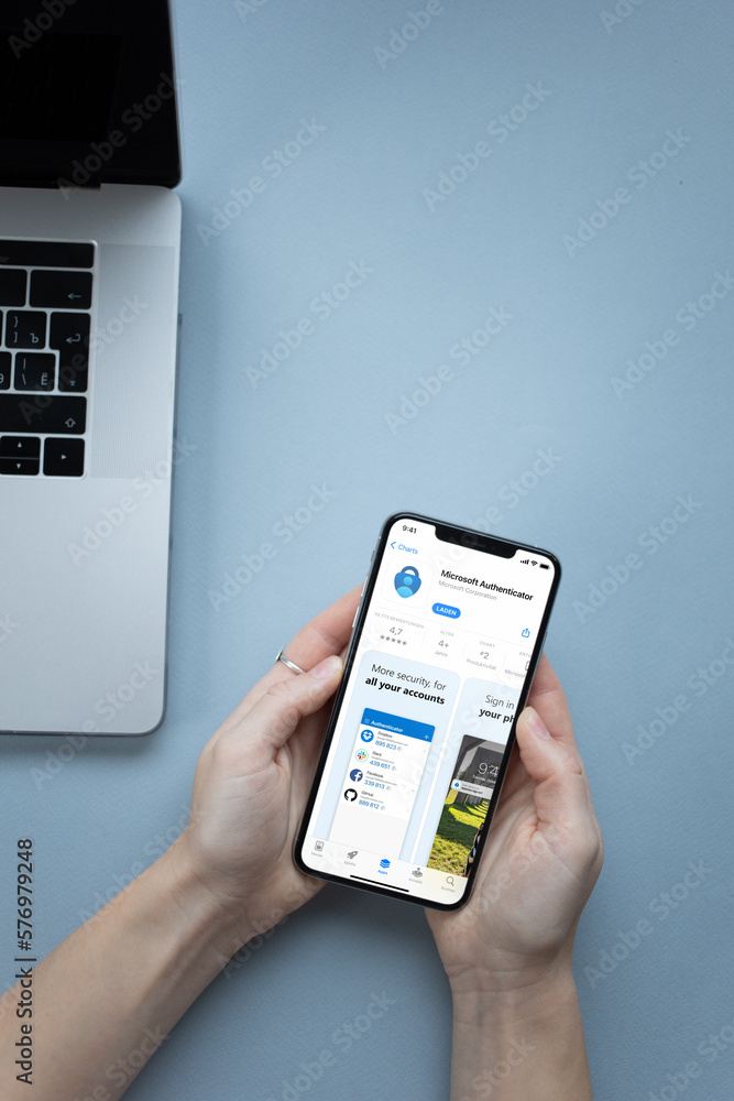 Mobile phone with Microsoft Authenticator App Store screen Stock Photo ...