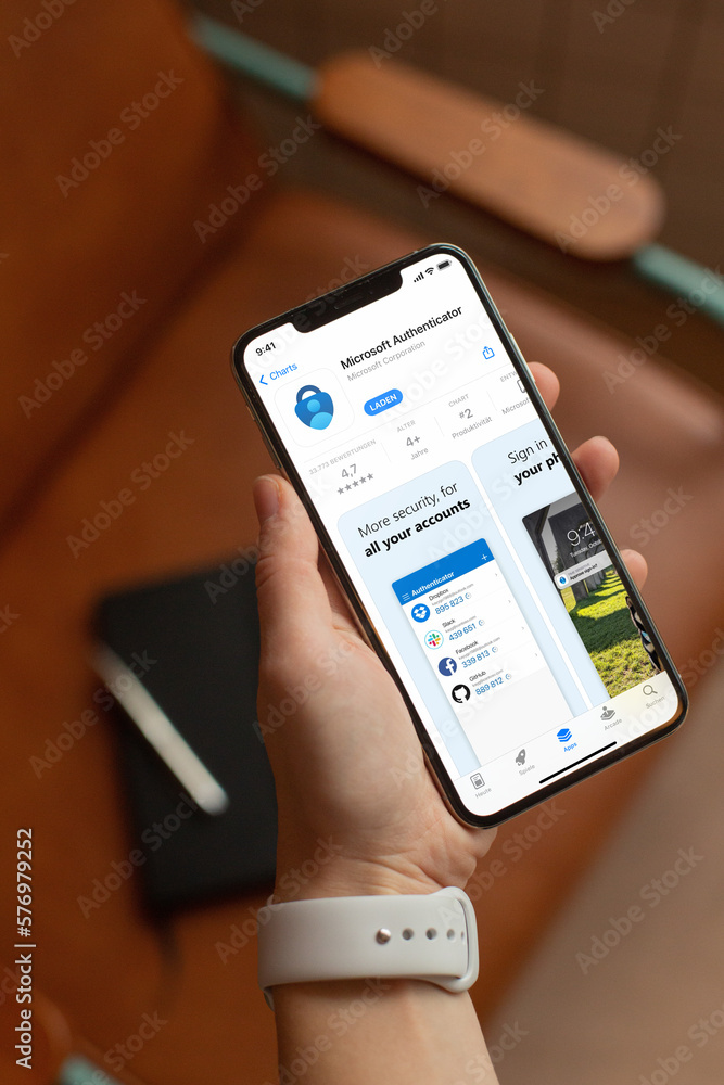 Mobile phone with Microsoft Authenticator App Store screen Stock Photo ...