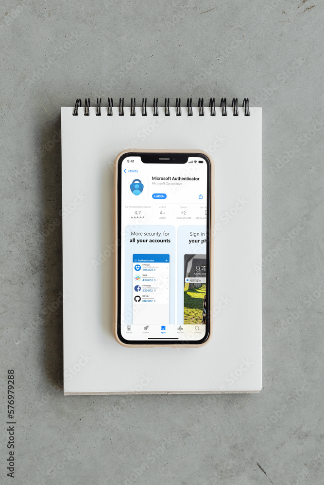 Mobile phone with Microsoft Authenticator App Store screen Stock Photo ...
