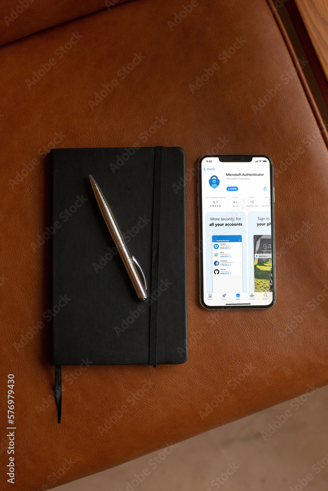 Mobile phone with Microsoft Authenticator App Store screen Stock Photo ...